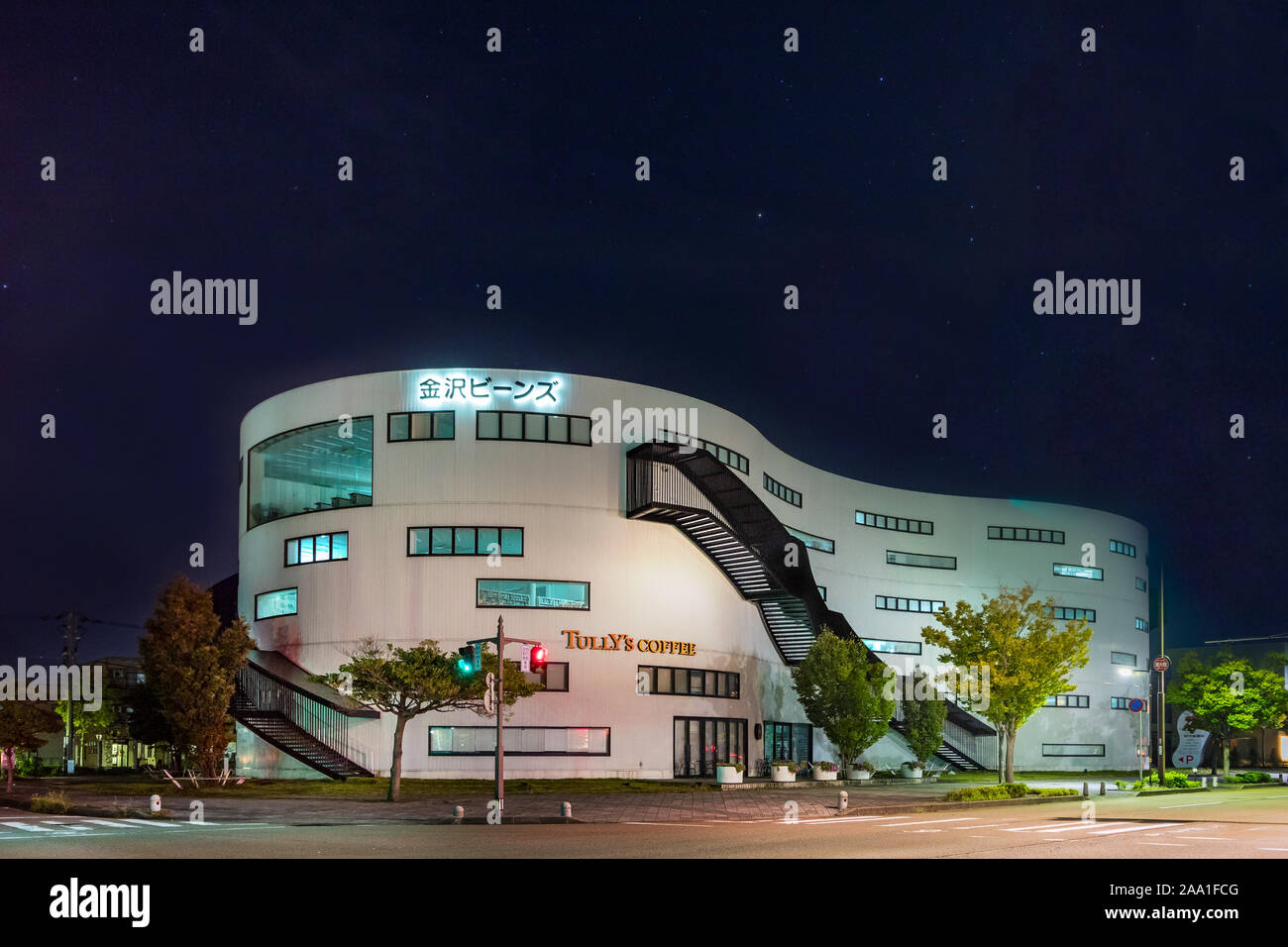 Night view of the Tully Coffee building located near the port in ...