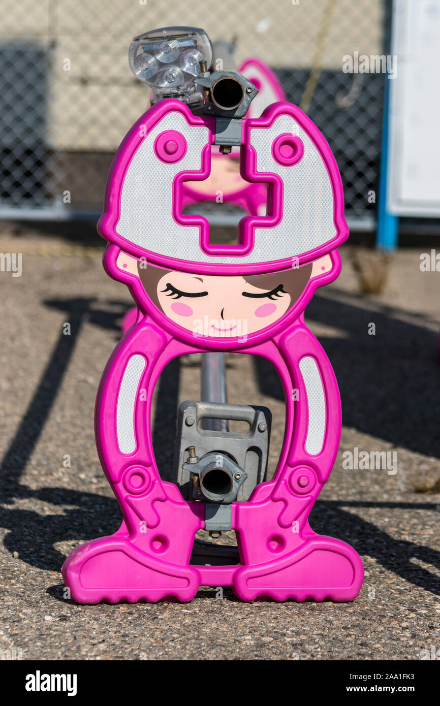 A japanese barricade sign with a character shape of a construction ...