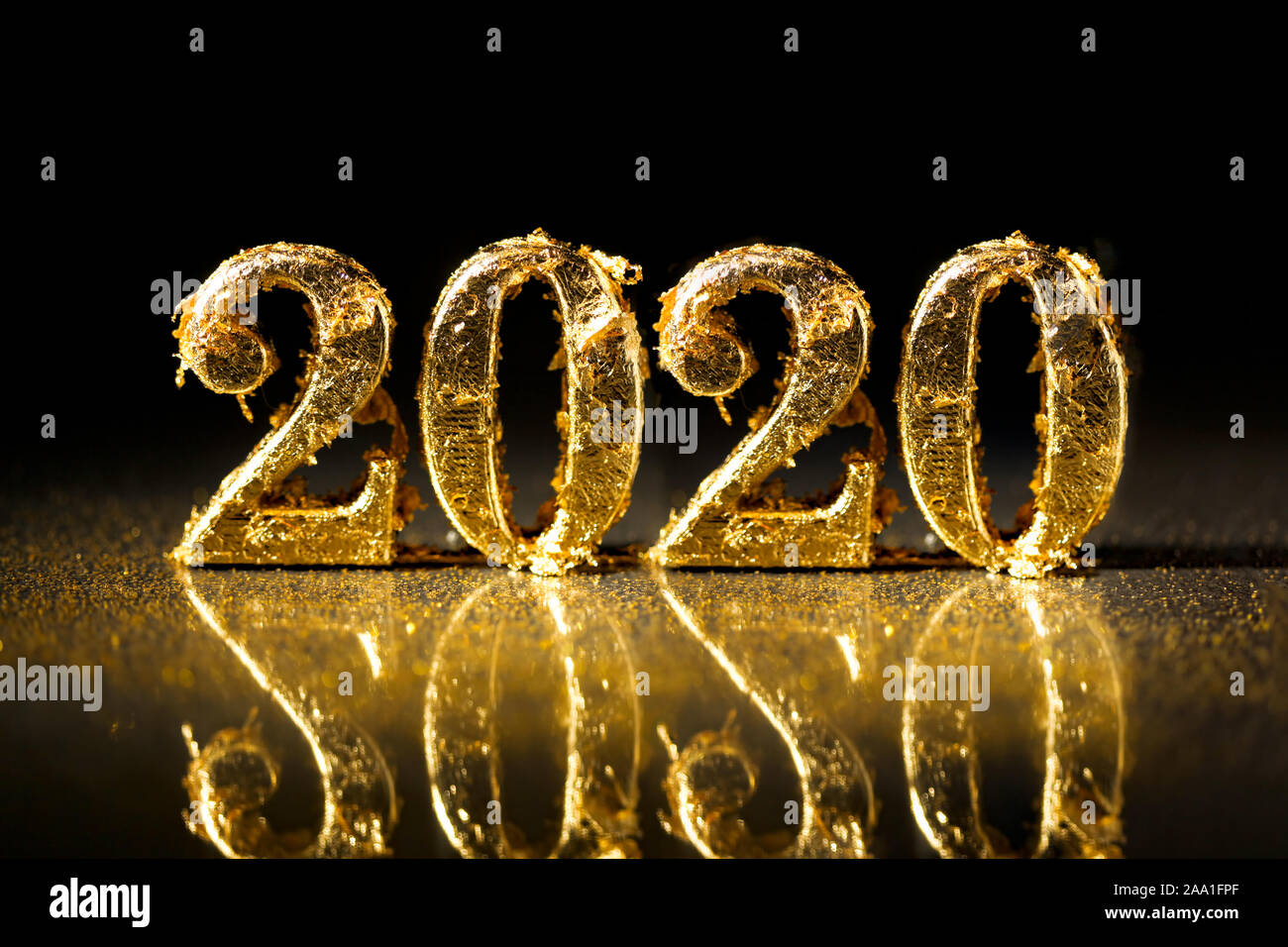 2020 in sparkling gold numbers celebrating the New Year or Christmas ...