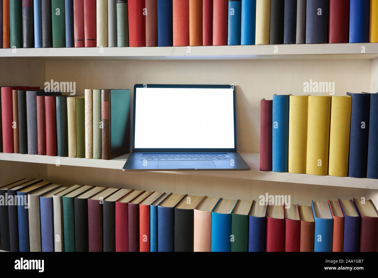 Laptop book shelves hi-res stock photography and images - Alamy