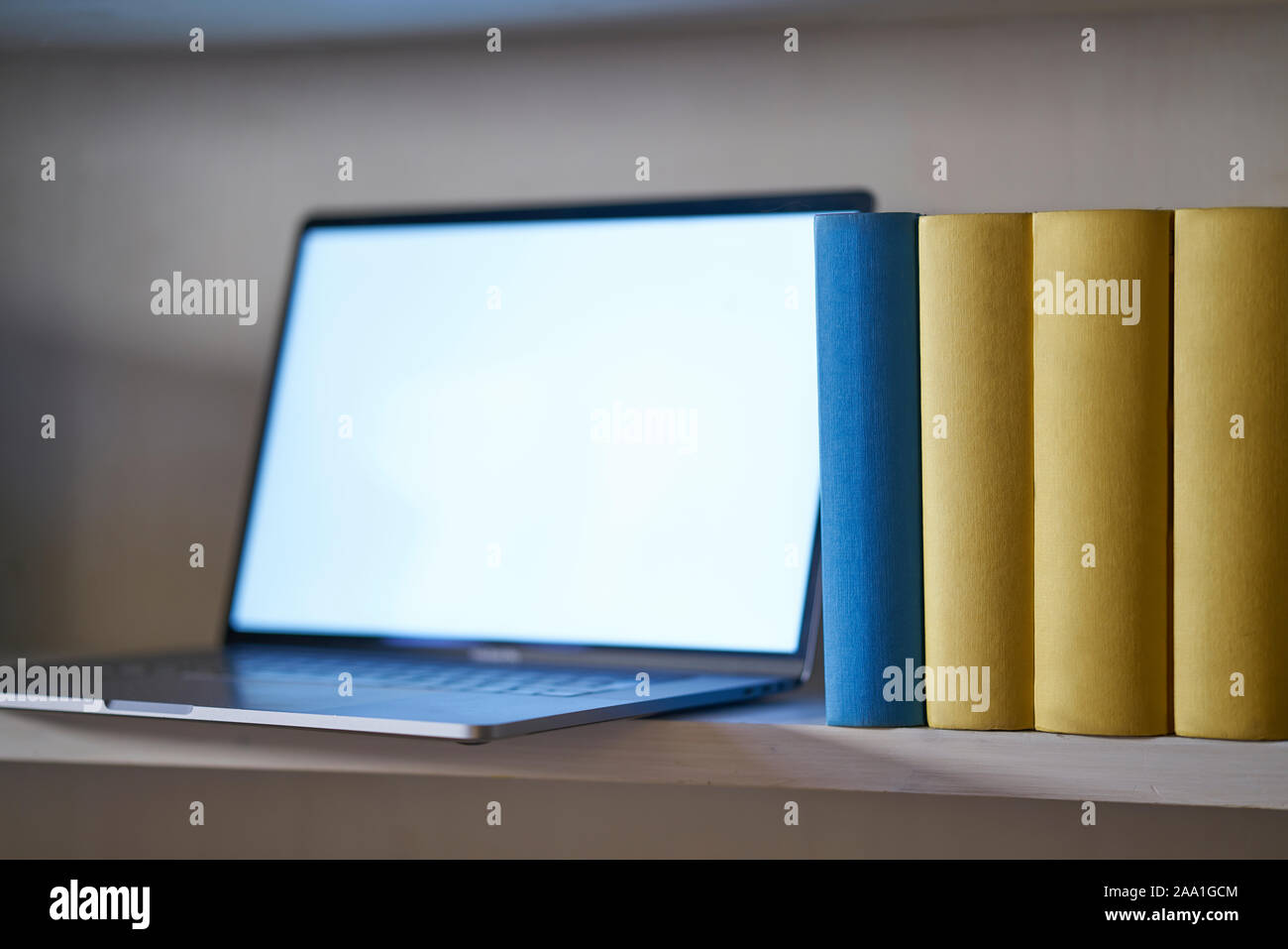 Laptop and books hi-res stock photography and images - Alamy