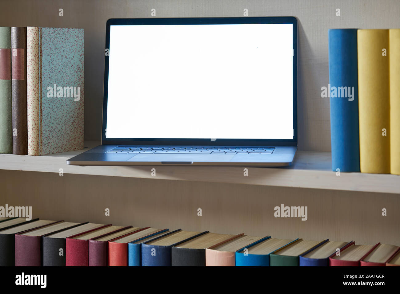 Library laptop notepad hi-res stock photography and images - Alamy