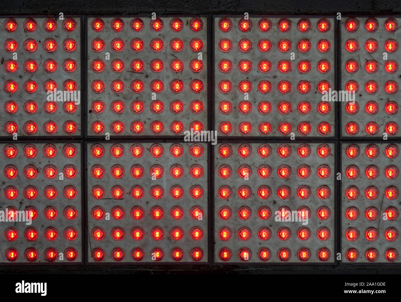 Red tactile walking surface indicators at a pedestrian crossing Stock ...