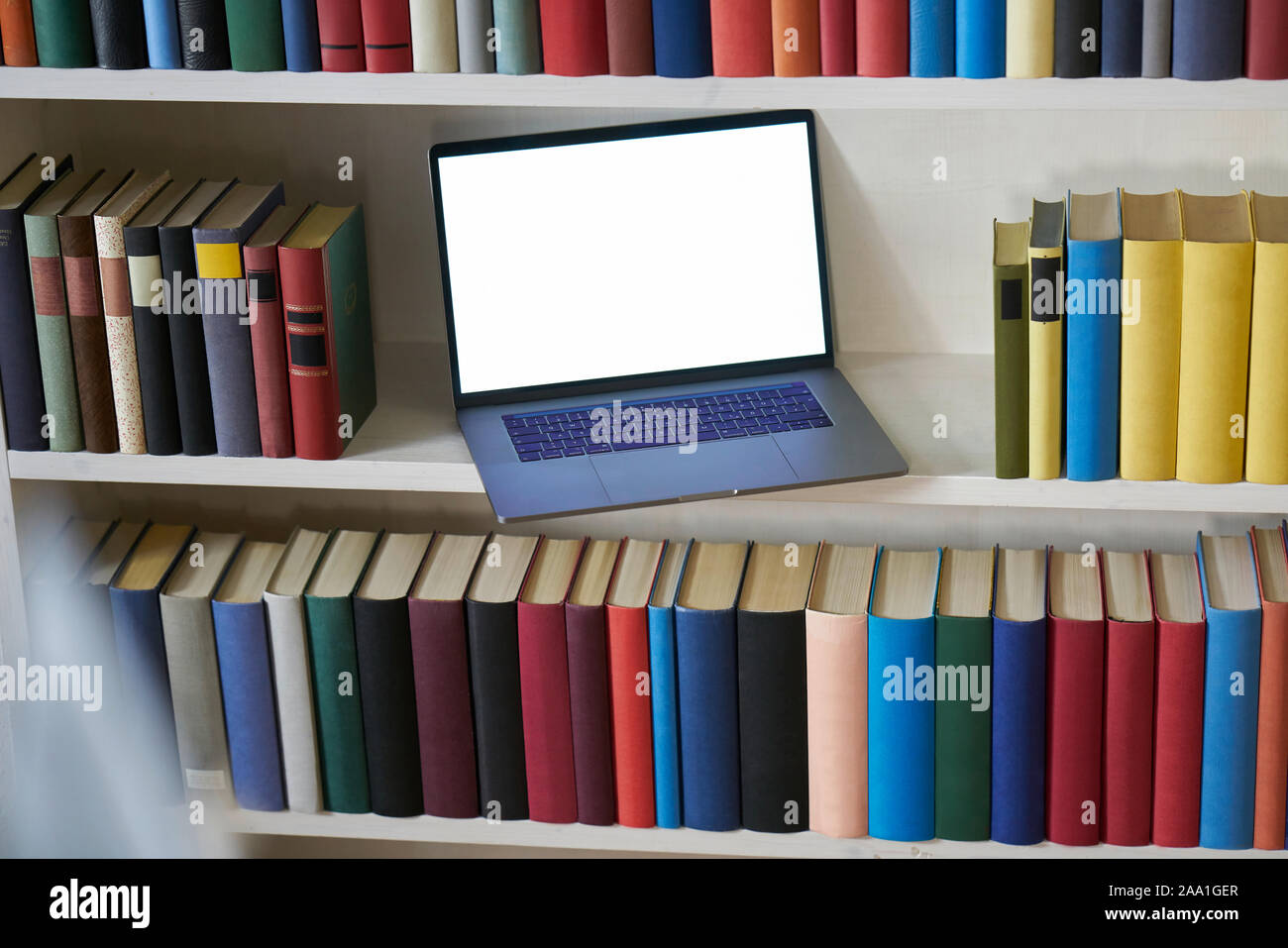 Computer and books from above with reflections Stock Photo - Alamy