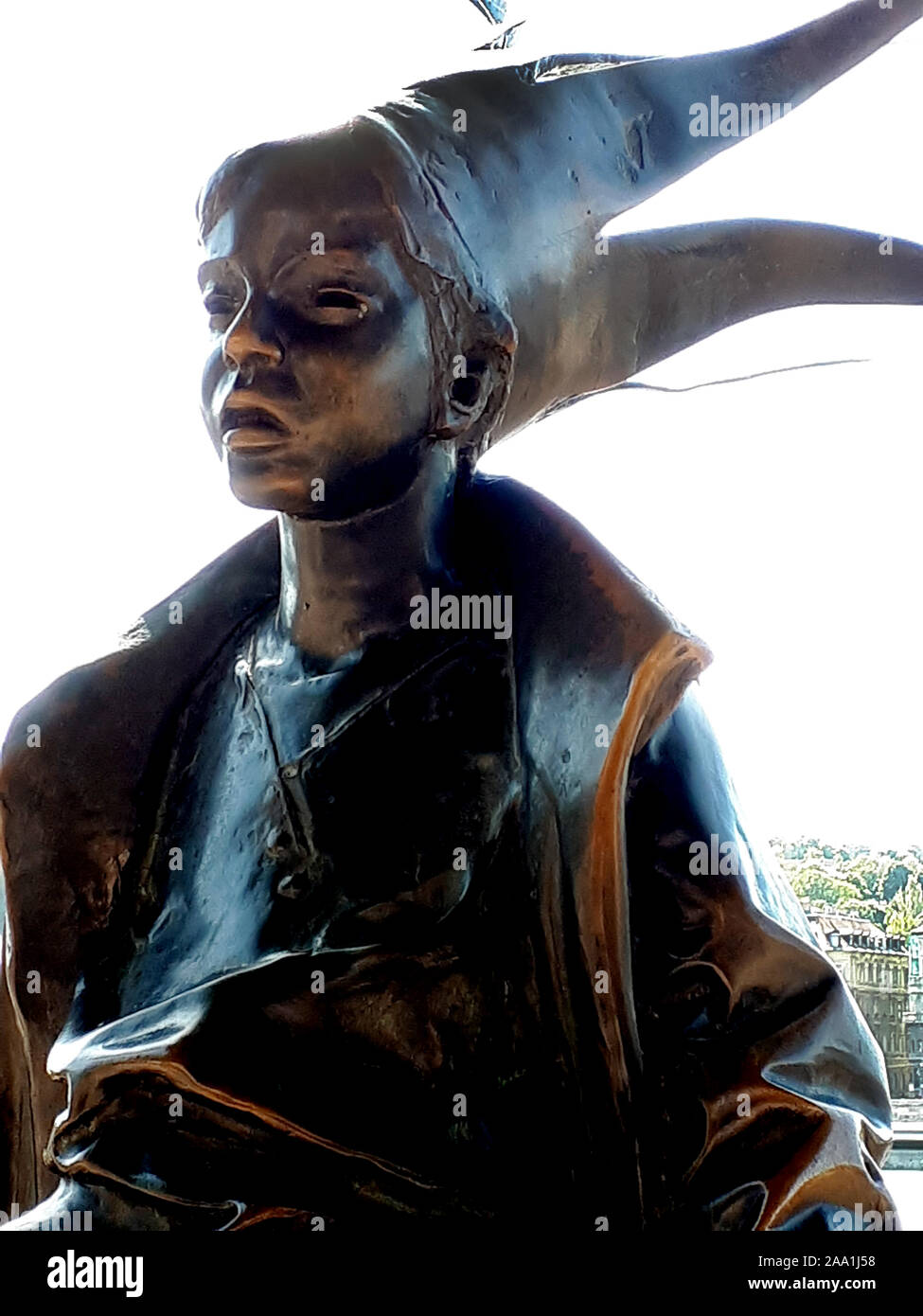 The statue of the Little Princess statue sitting on the railings of the ...