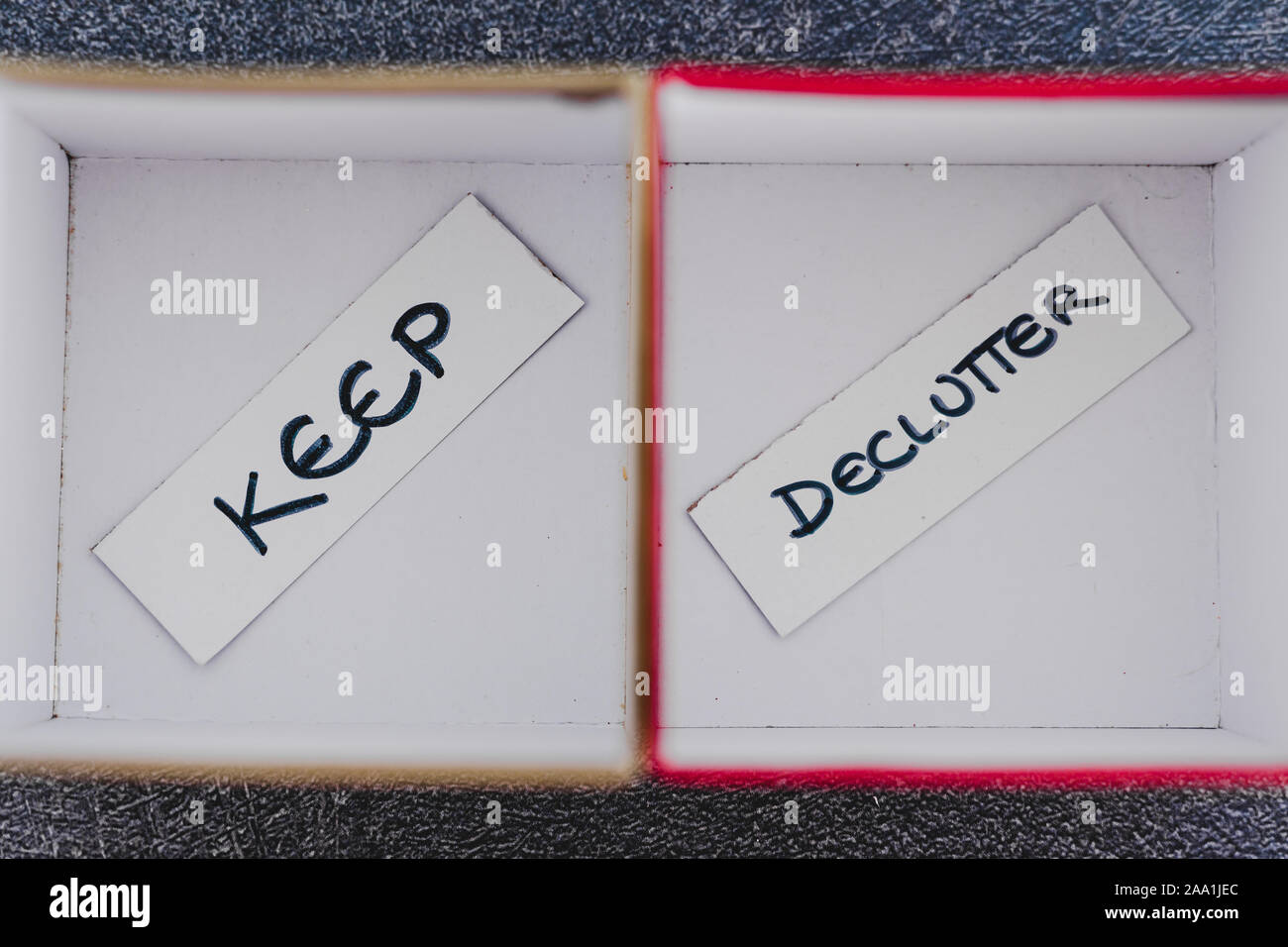 decluttering and tidying up conceptual still-life, storage boxes with ...