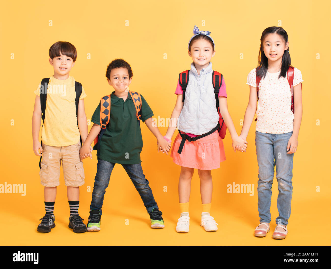 Happy school children hi-res stock photography and images - Alamy
