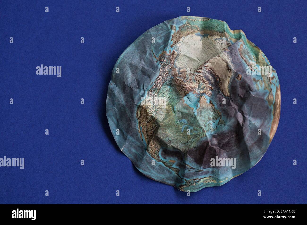 A crumpled paper earth Stock Photo - Alamy