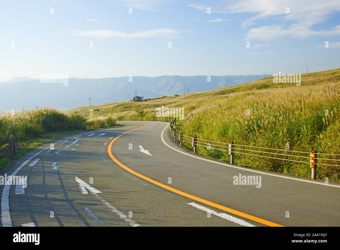 Mountain road on Mt. Aso, autumn Stock Photo - Alamy