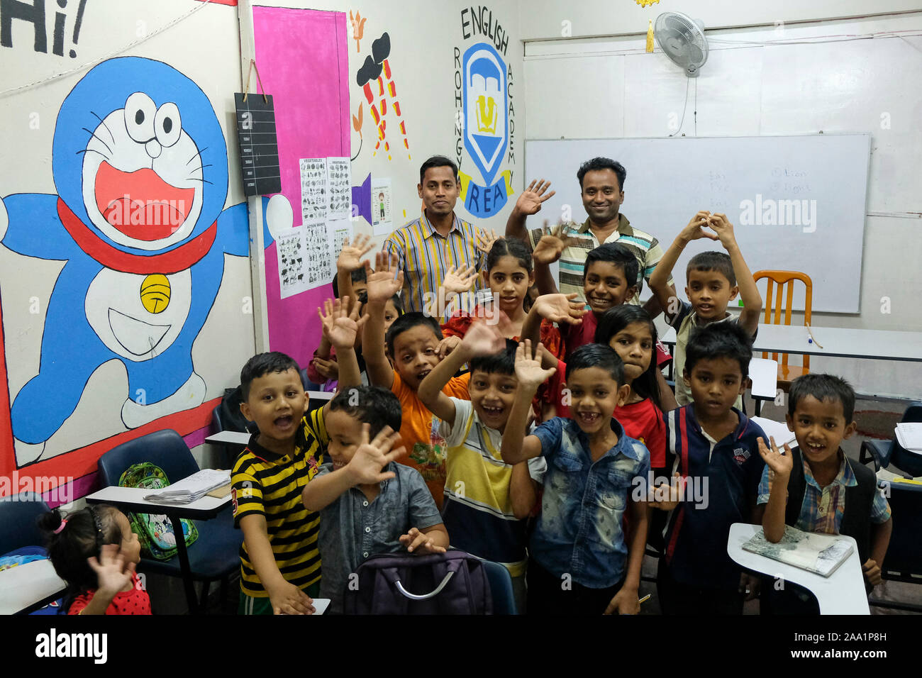 Students waving at teacher hi-res stock photography and images - Alamy