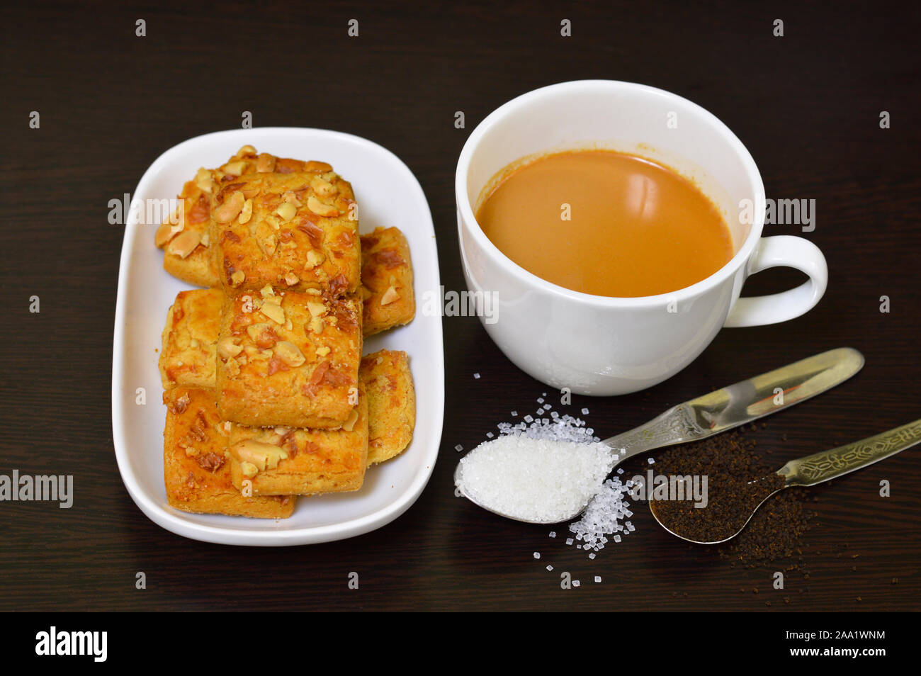 Cup tea delicious bun hi-res stock photography and images - Alamy