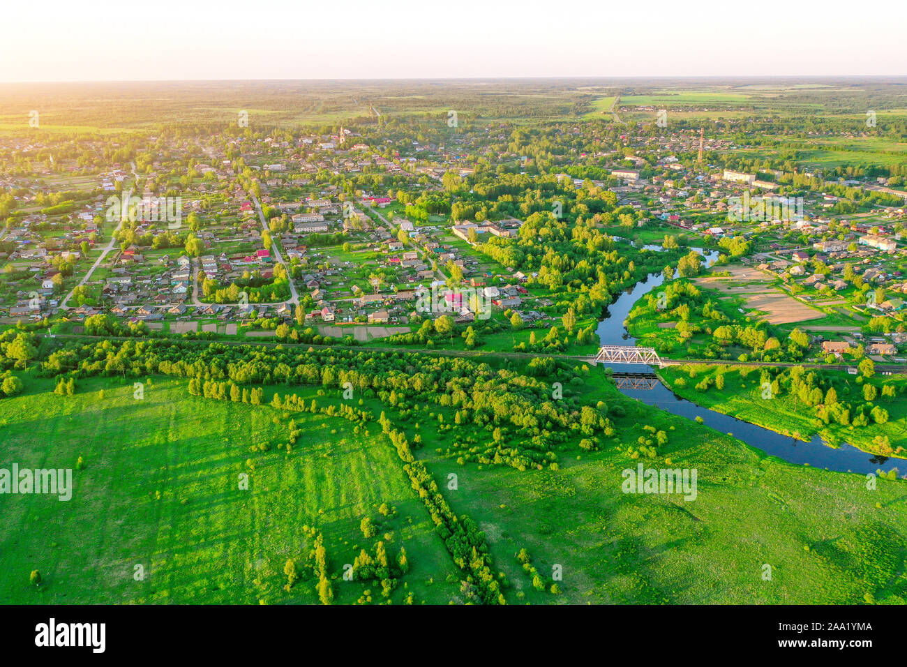 Aerial view landscape of winding small river among the small town ...