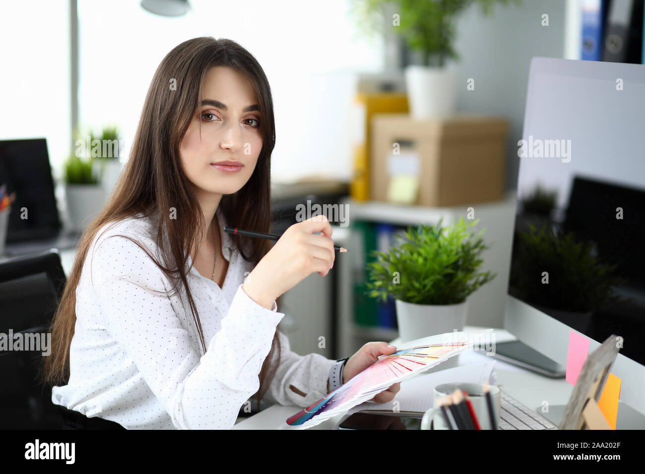 Cute lady drawing design interior project Stock Photo - Alamy