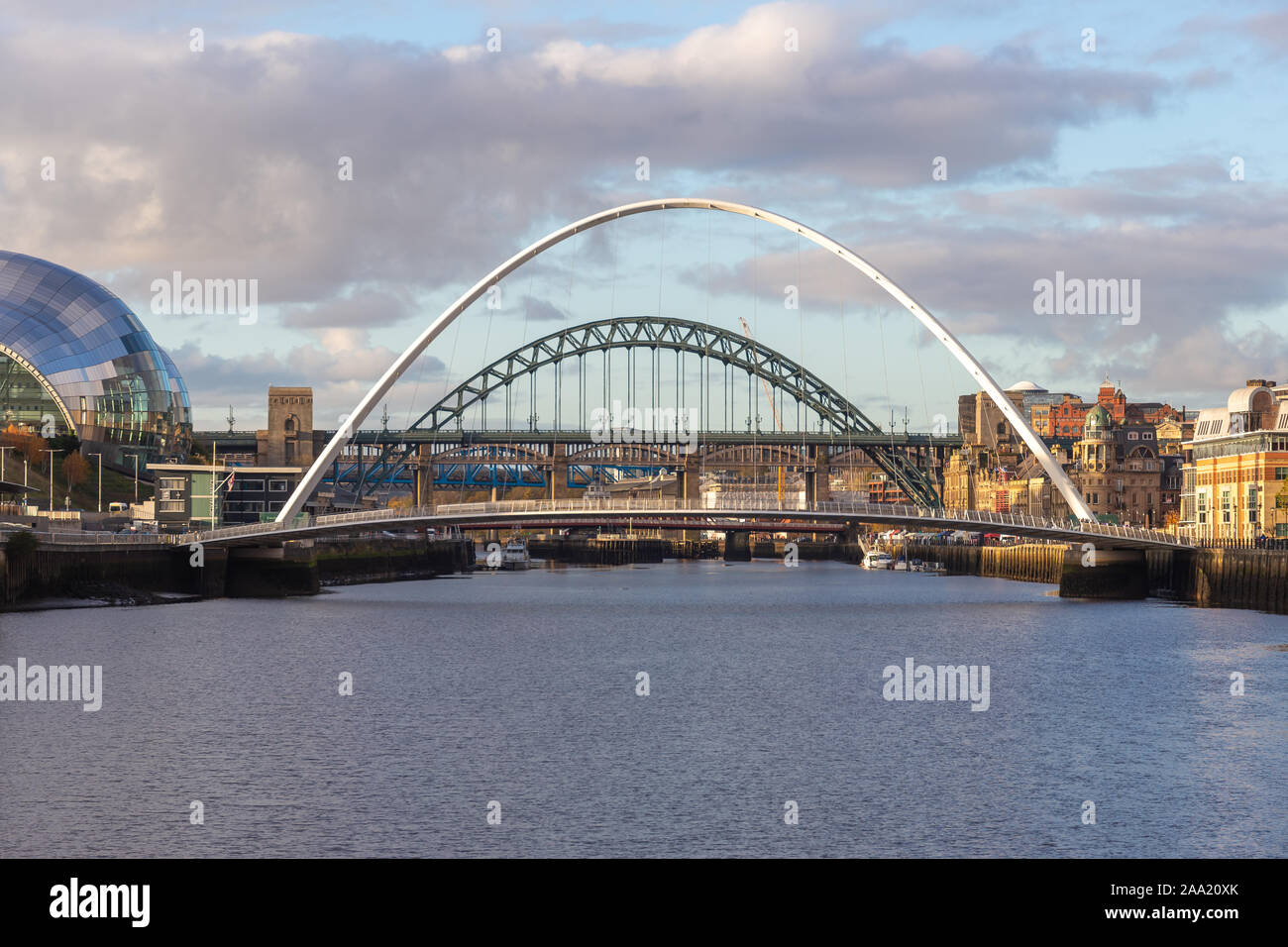 Gateshead Millennium and Tyne Bridge over the River Tyne, Newcastle, UK ...