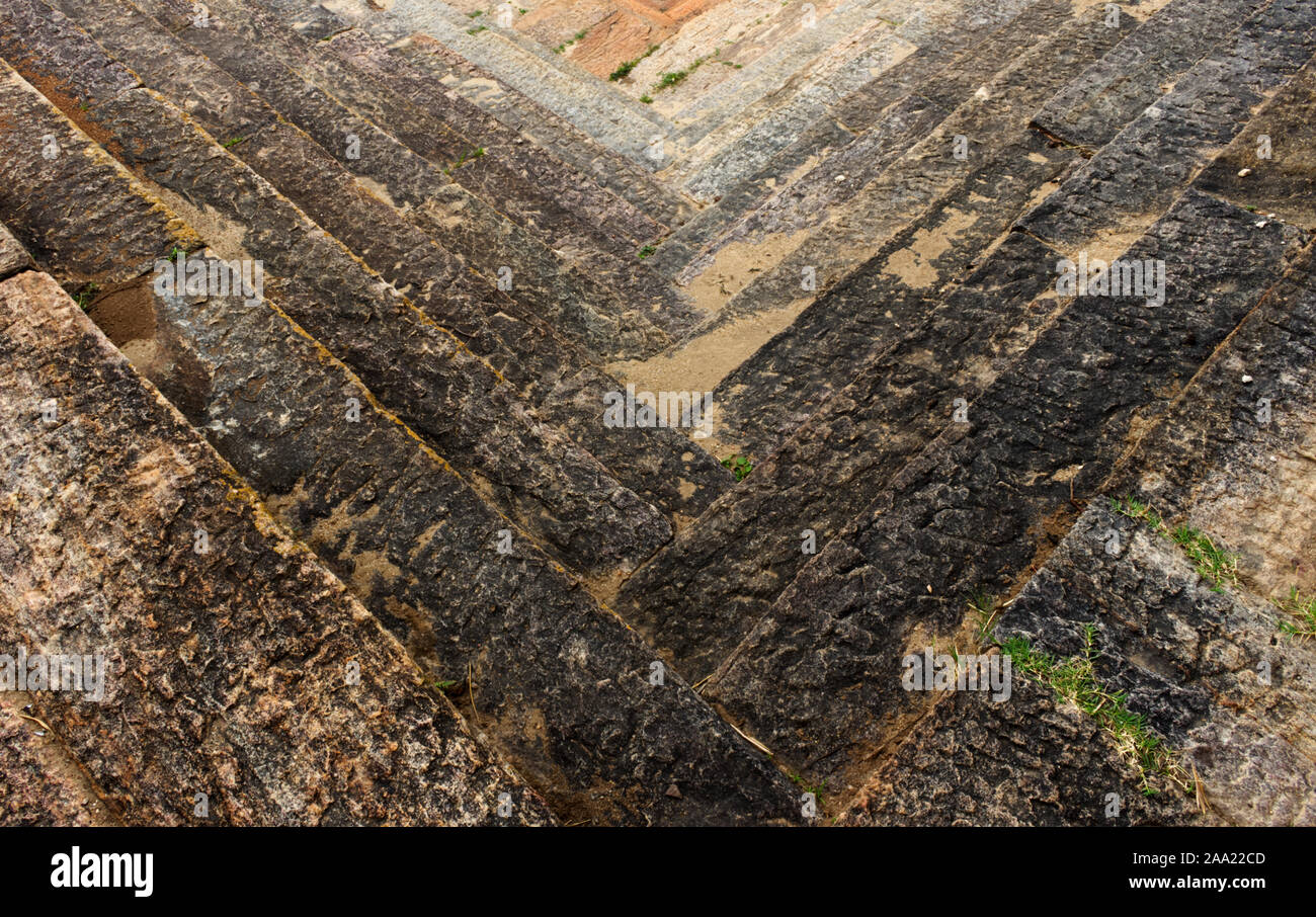Old V shape stone steps pattern Stock Photo - Alamy