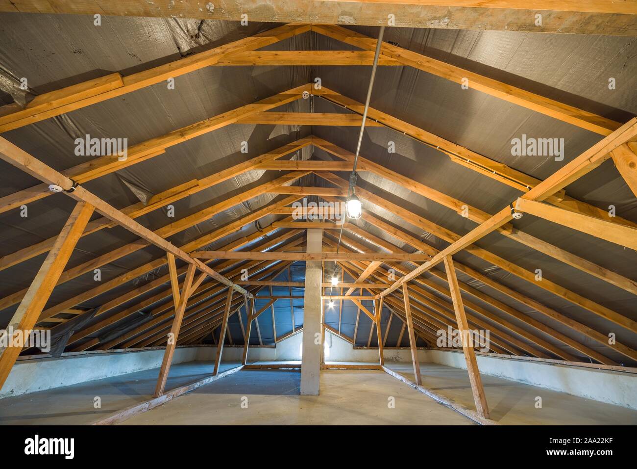 Attic of a building with wooden beams of a roof structure Stock Photo ...