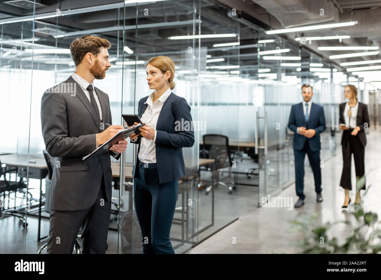 Walking group of men in suits hi-res stock photography and images - Alamy