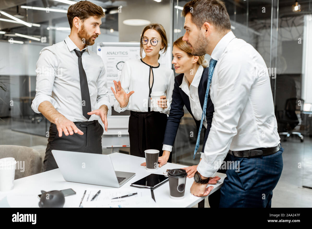 Business people hard working during a conference, standing together ...