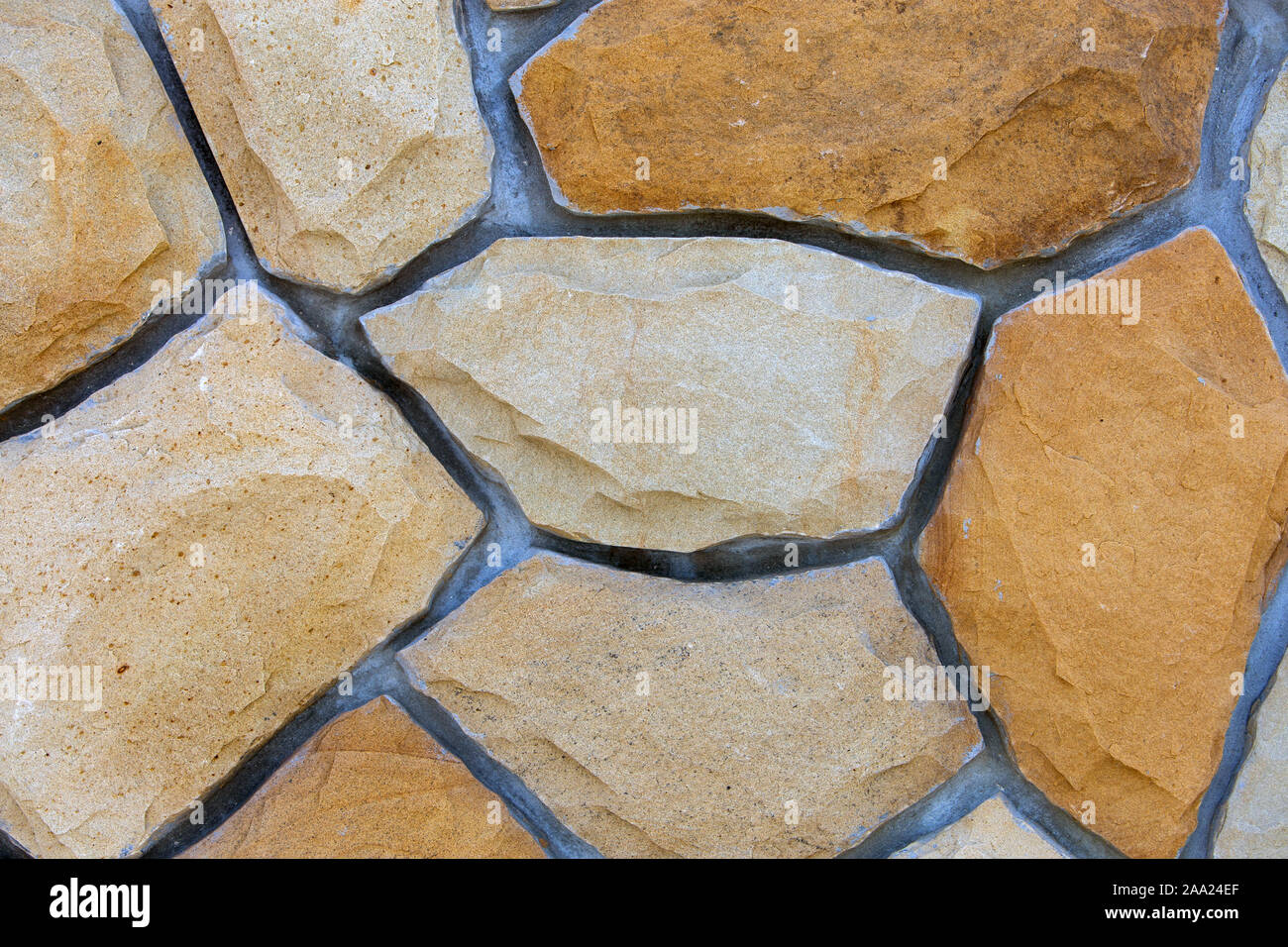 Abstract wall surface made from sand stones for usage as background ...