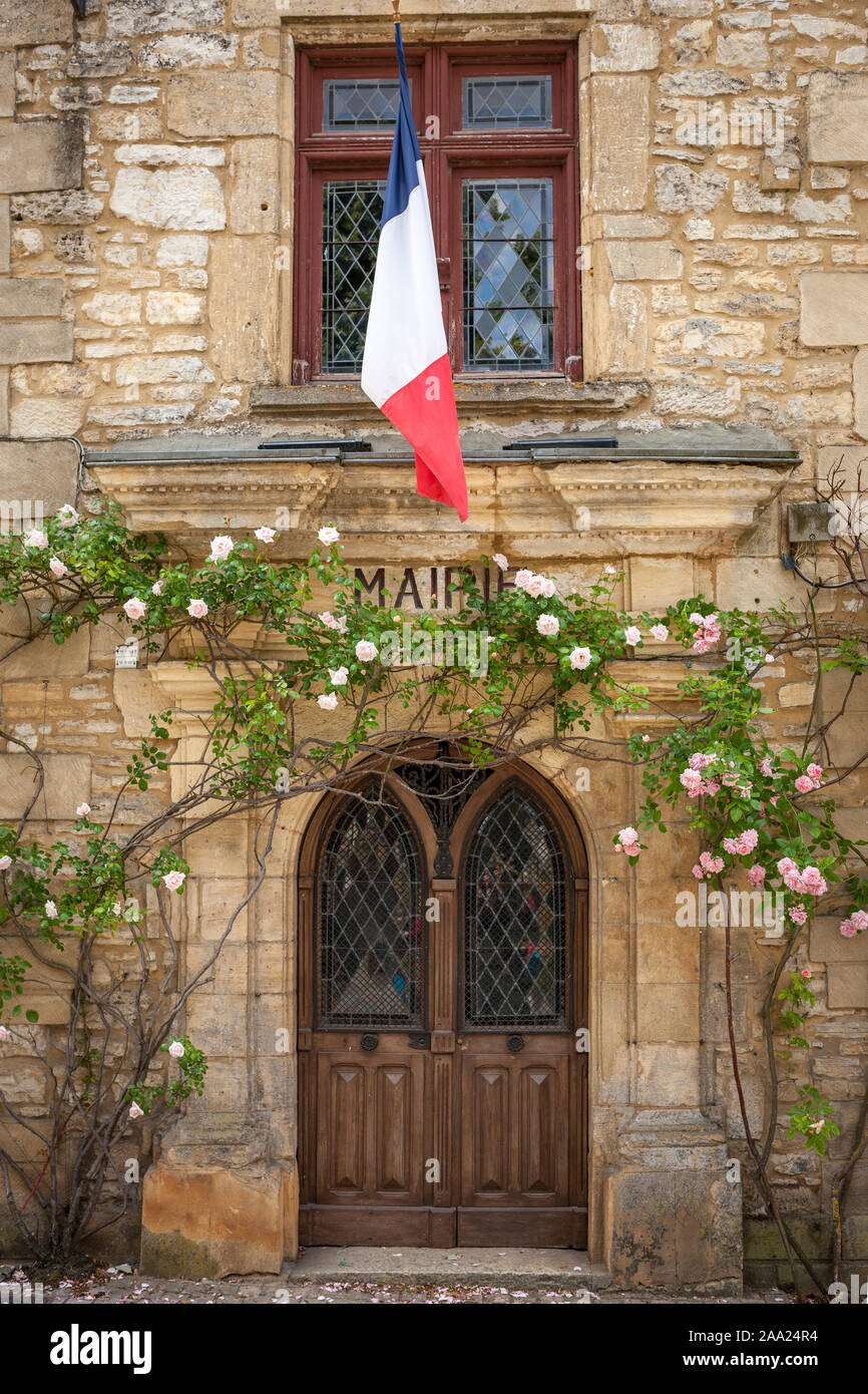 Ornate front door of French Mayors office with pink roses Stock Photo ...