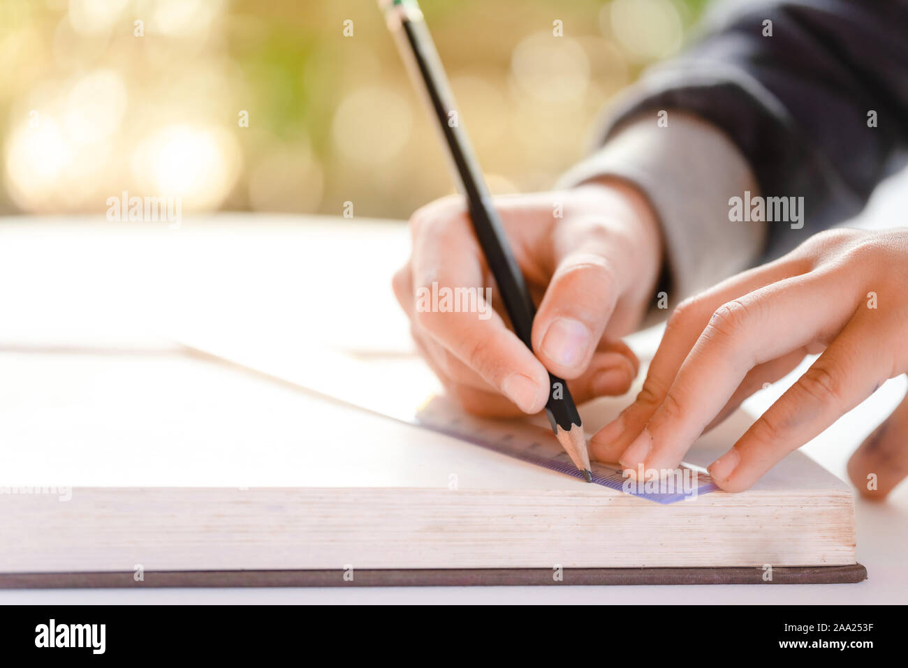 Draw a line with a ruler Stock Photo - Alamy