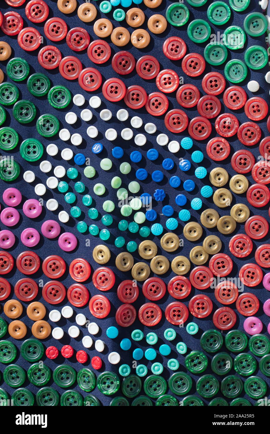 Background many buttons on the fabric vertically Stock Photo - Alamy