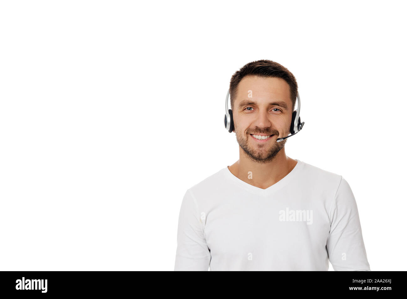 Call center worker man isolated on white background. Young smiling ...