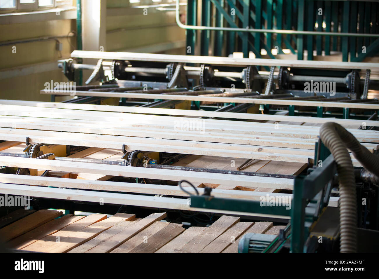 Wood processing plant. Wood cutting workshop Stock Photo - Alamy