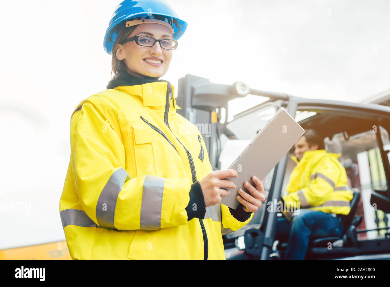 Worker in delivery center planning the logistics Stock Photo - Alamy