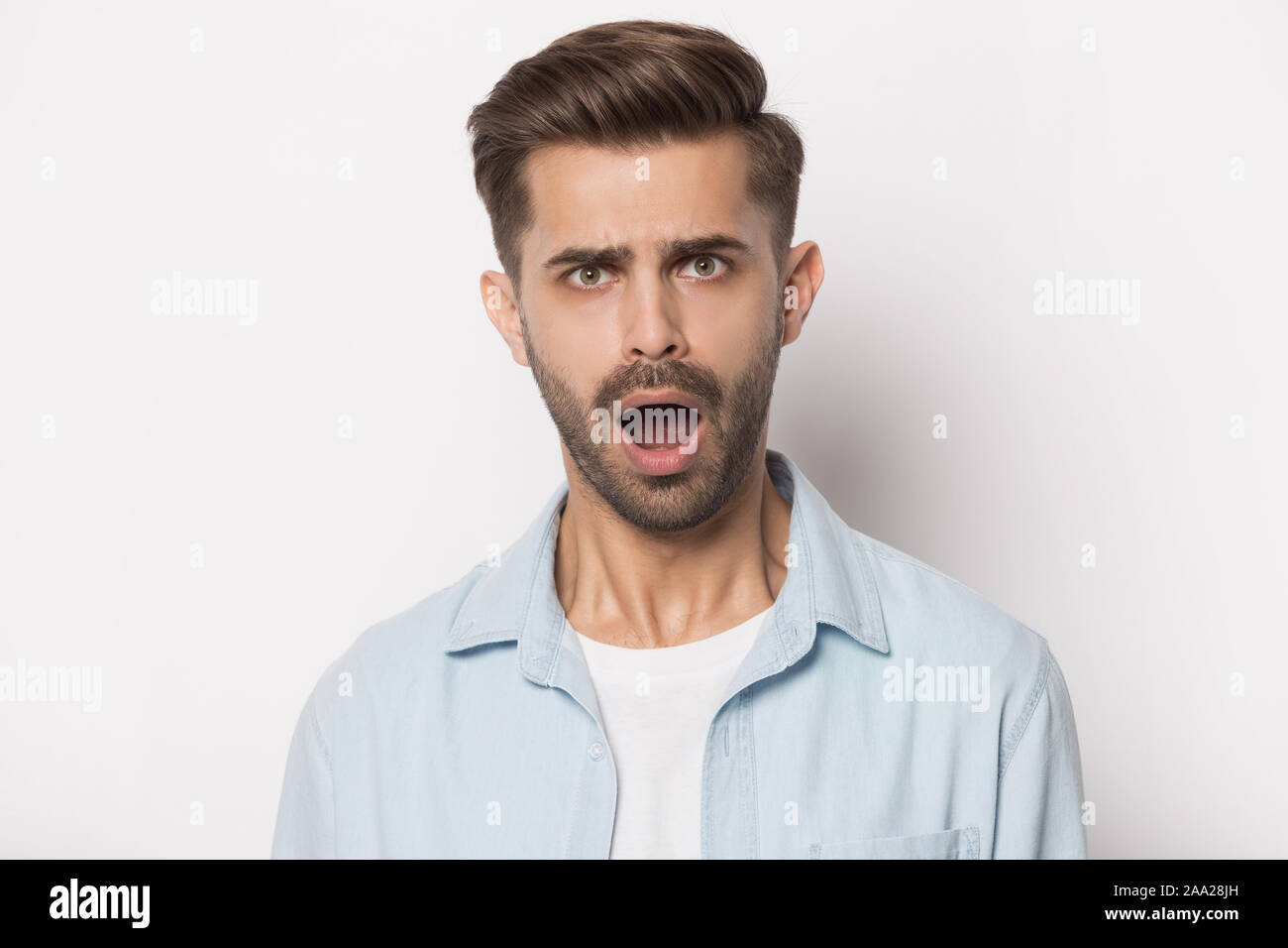 Scared young bearded man hi-res stock photography and images - Alamy