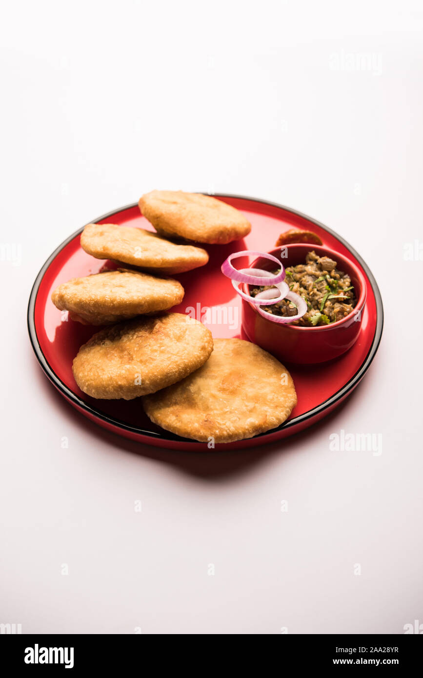 Fried Sattu Litti chokha served with Baingan Bharta, onion and pickle ...