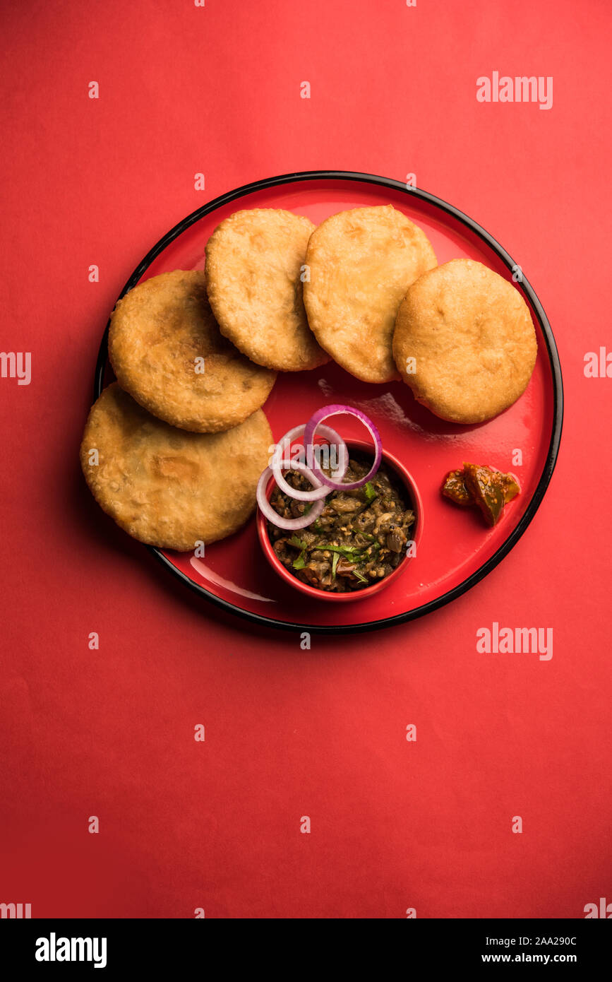 Fried Sattu Litti chokha served with Baingan Bharta, onion and pickle ...