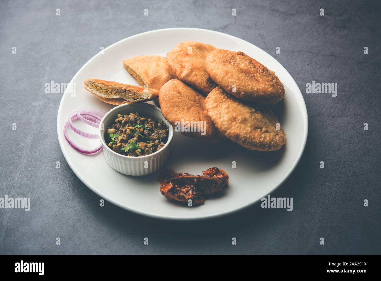 Fried Sattu Litti chokha served with Baingan Bharta, onion and pickle ...