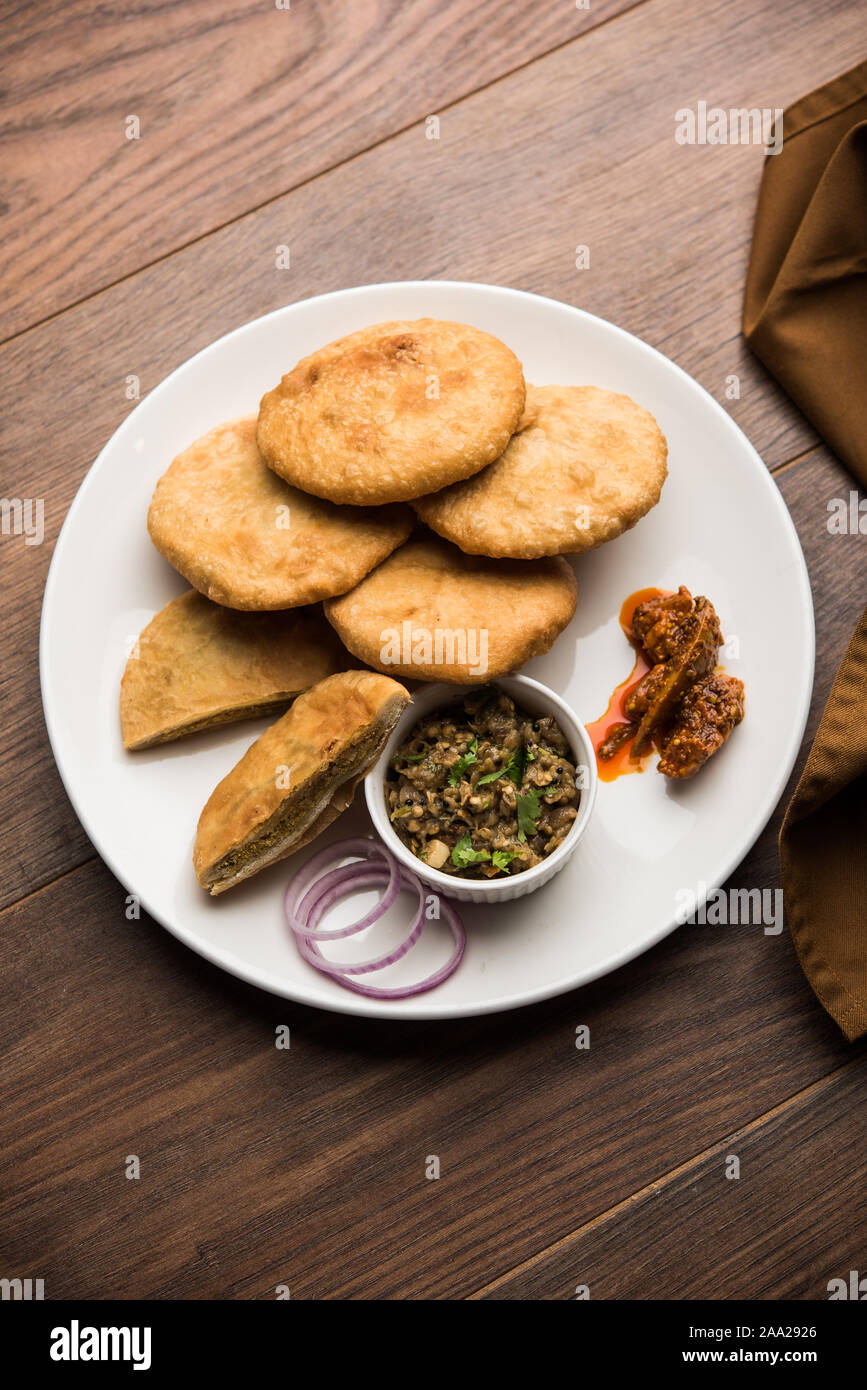 Fried Sattu Litti chokha served with Baingan Bharta, onion and pickle ...