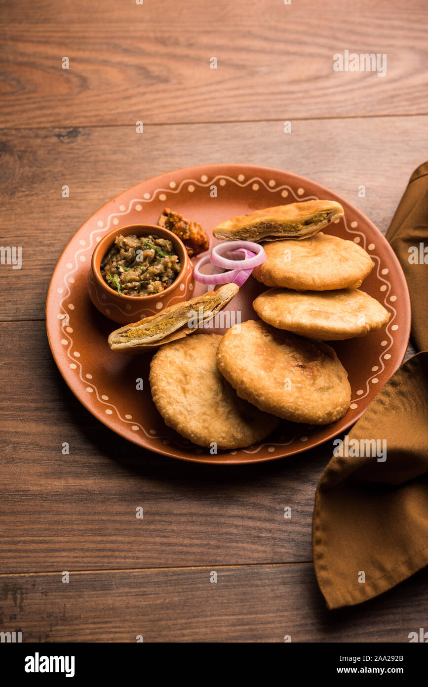 Fried Sattu Litti chokha served with Baingan Bharta, onion and pickle ...
