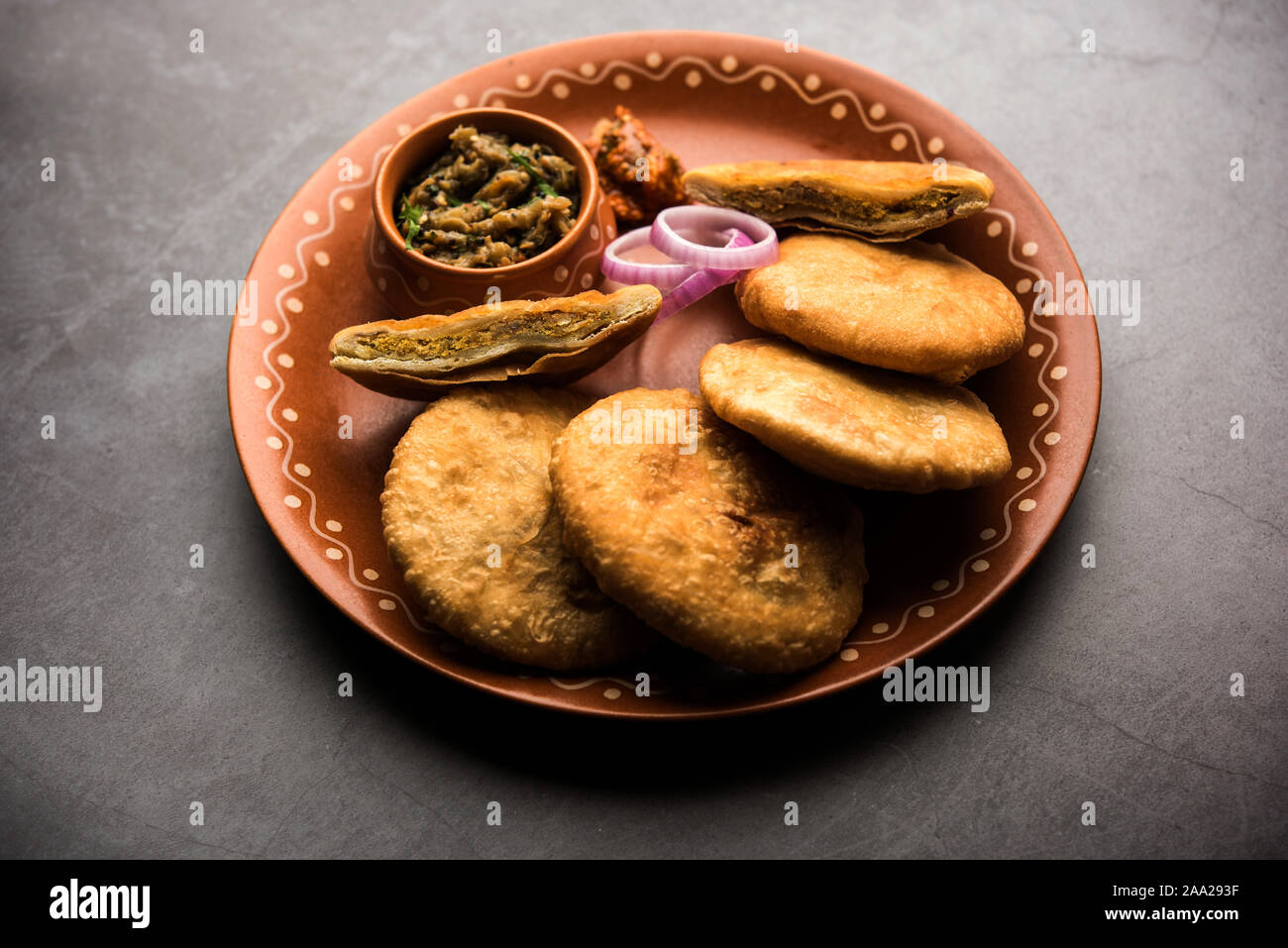 Fried Sattu Litti chokha served with Baingan Bharta, onion and pickle ...