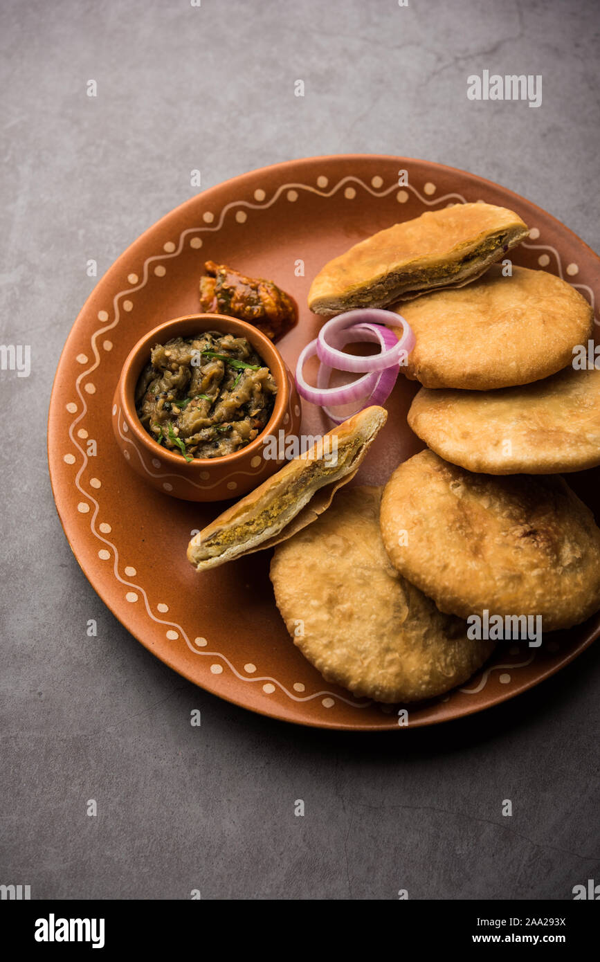 Fried Sattu Litti chokha served with Baingan Bharta, onion and pickle ...