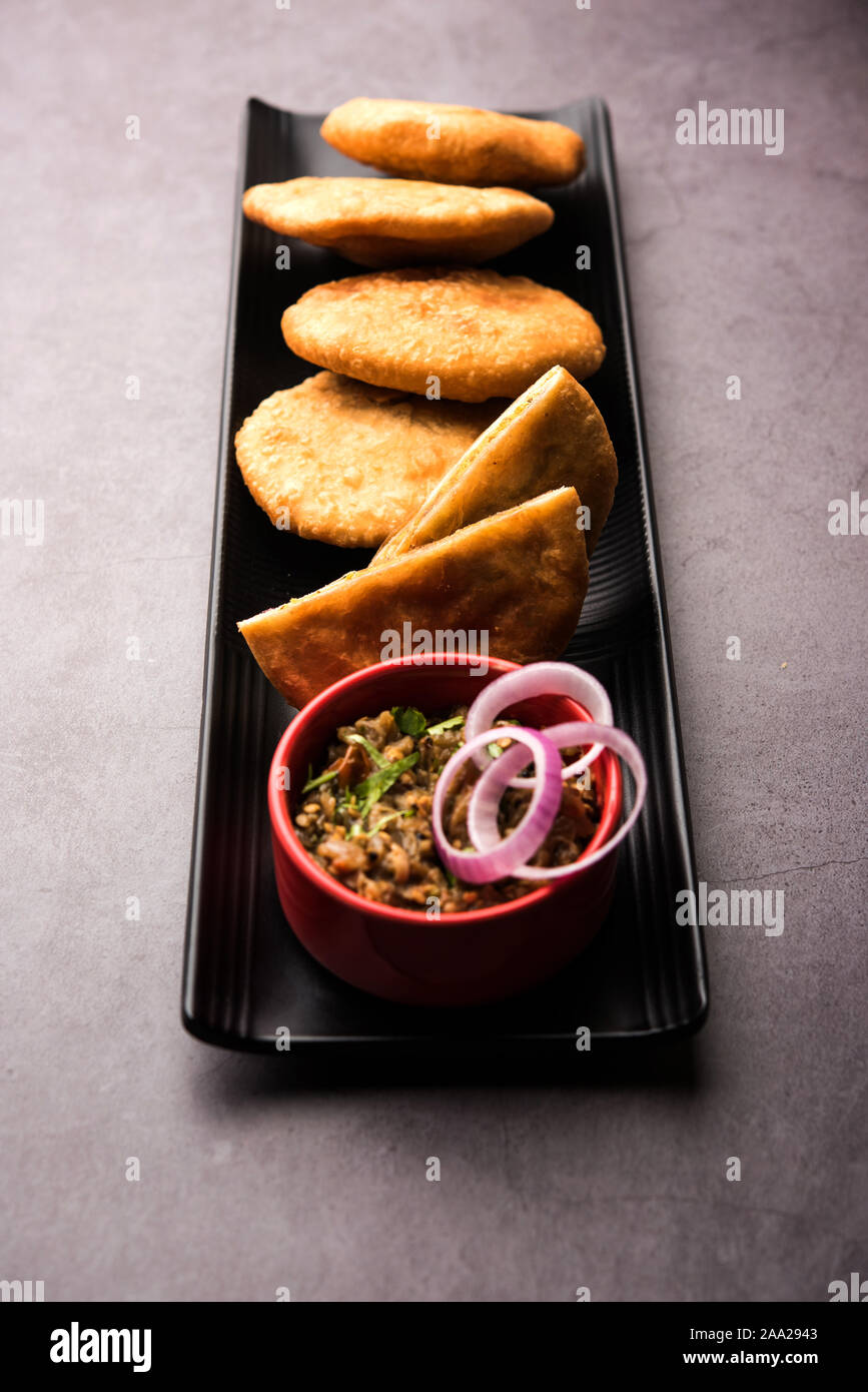 Fried Sattu Litti chokha served with Baingan Bharta, onion and pickle ...