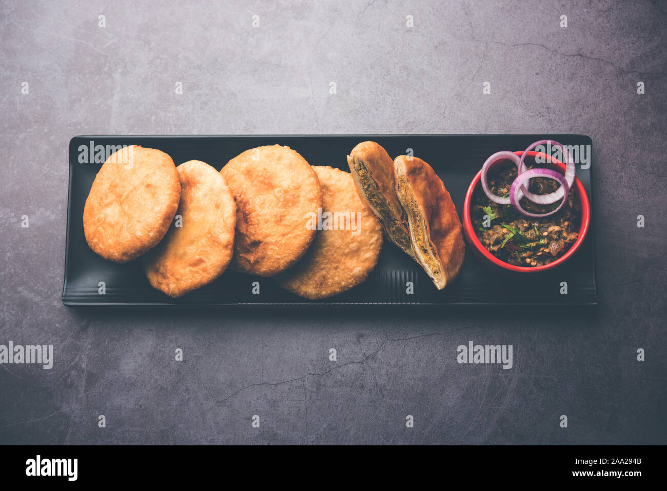 Fried Sattu Litti chokha served with Baingan Bharta, onion and pickle ...