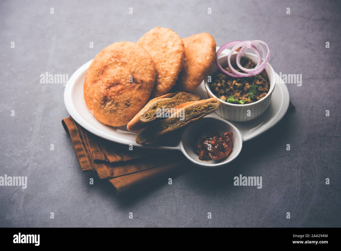 Fried Sattu Litti chokha served with Baingan Bharta, onion and pickle ...