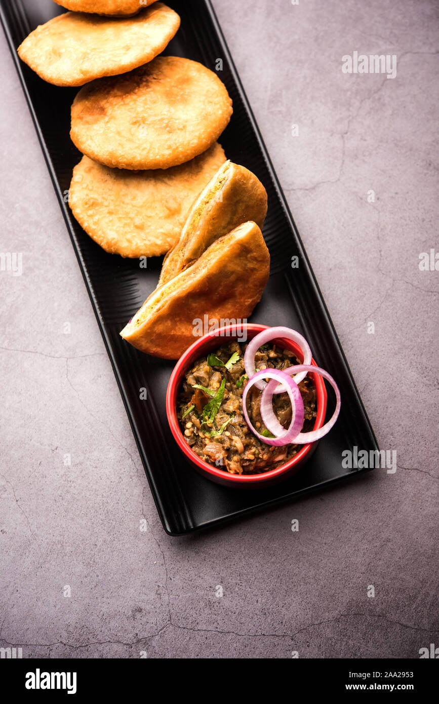 Fried Sattu Litti chokha served with Baingan Bharta, onion and pickle ...