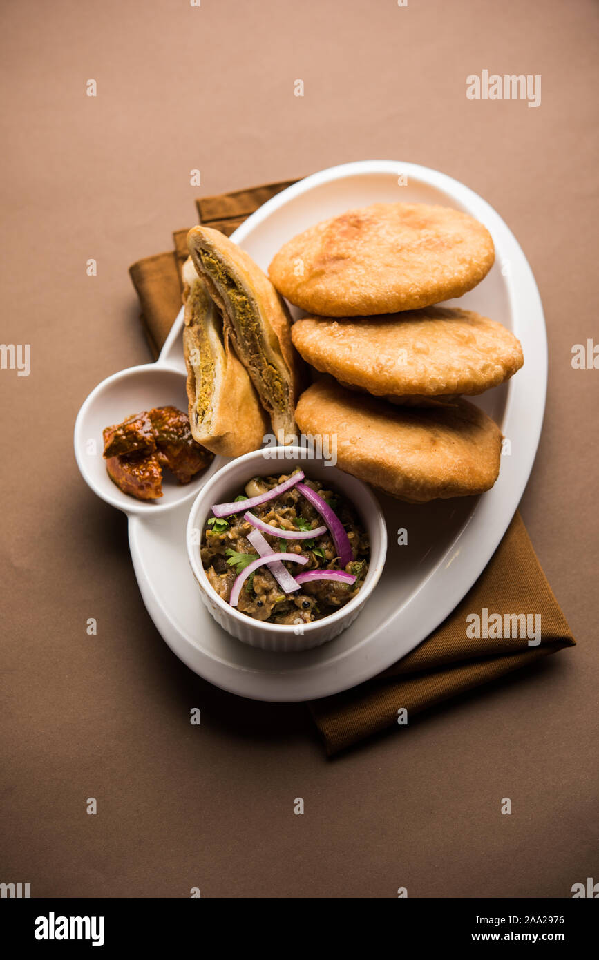 Fried Sattu Litti chokha served with Baingan Bharta, onion and pickle ...