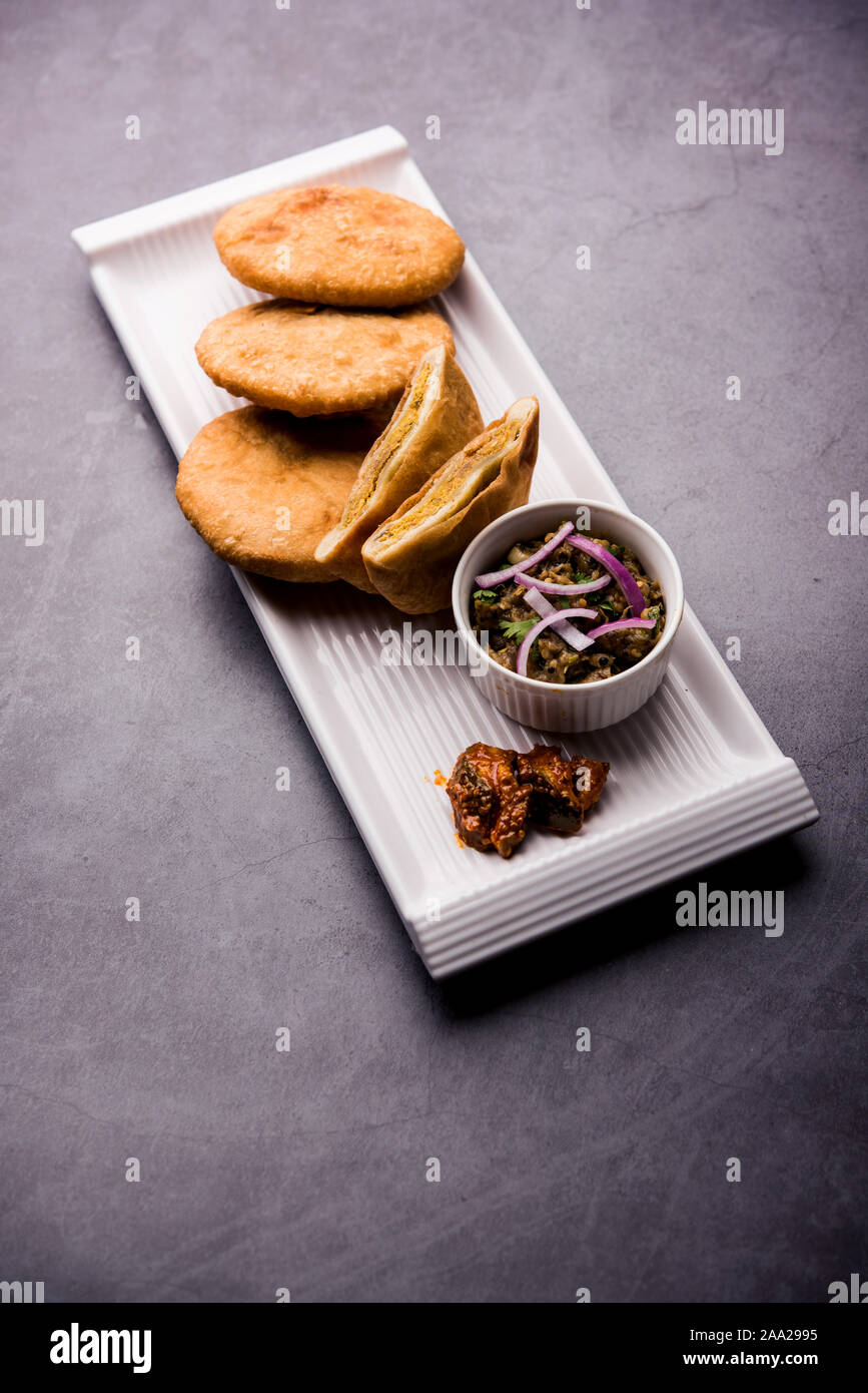 Fried Sattu Litti chokha served with Baingan Bharta, onion and pickle ...