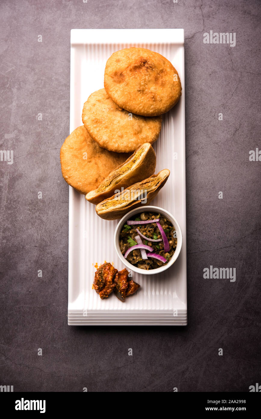 Fried Sattu Litti chokha served with Baingan Bharta, onion and pickle ...