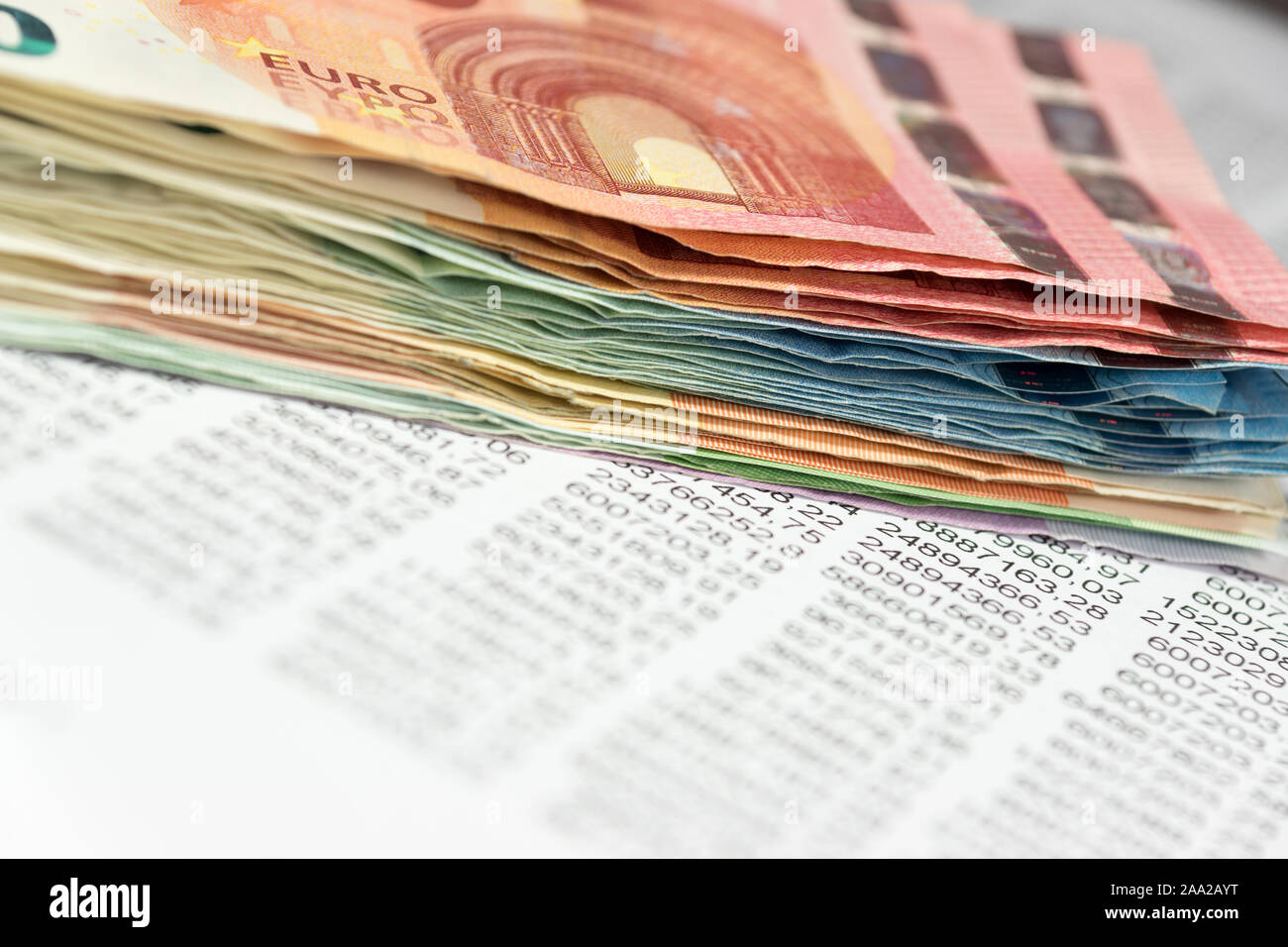 Euro banknotes and spreadsheet Stock Photo - Alamy