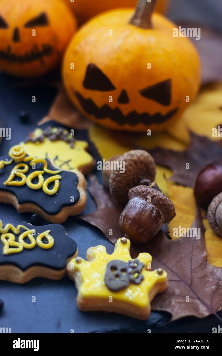 Halloween gingerbread cookies on dark background, with halloween mini ...