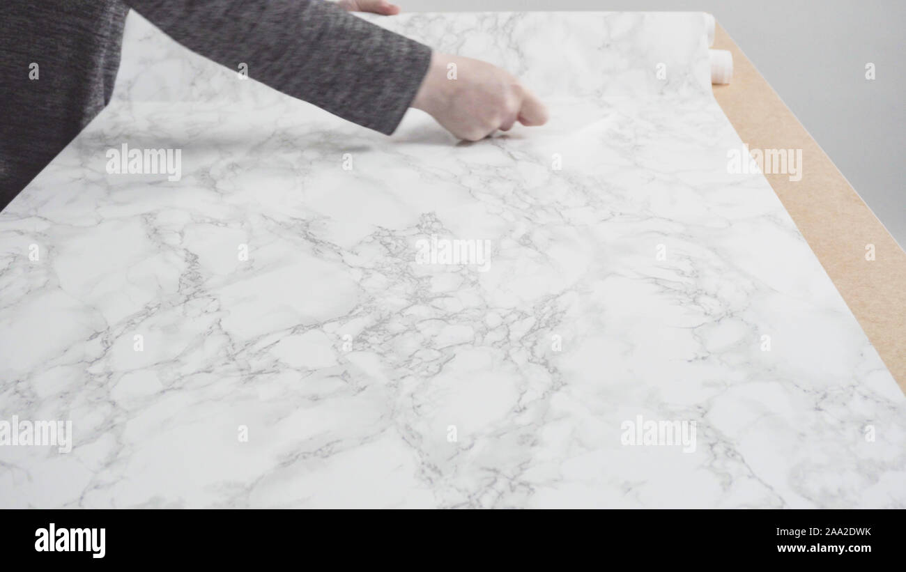 Making marble board with adhesive paper for food photography Stock ...