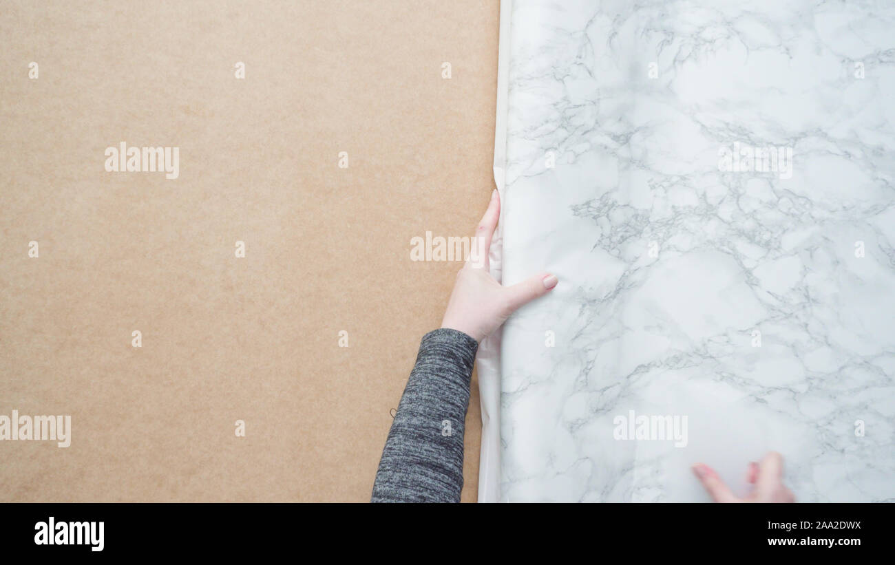 Flat lay. Making marble board with adhesive paper for food photography ...