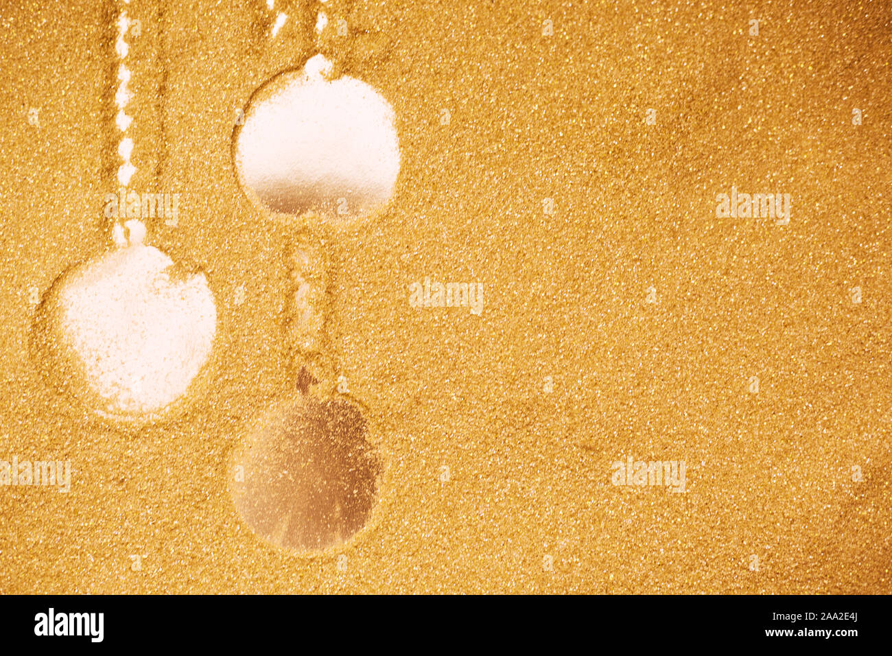 Hand drawn Christmas ball bauble ornament symbol on golden glitter ...