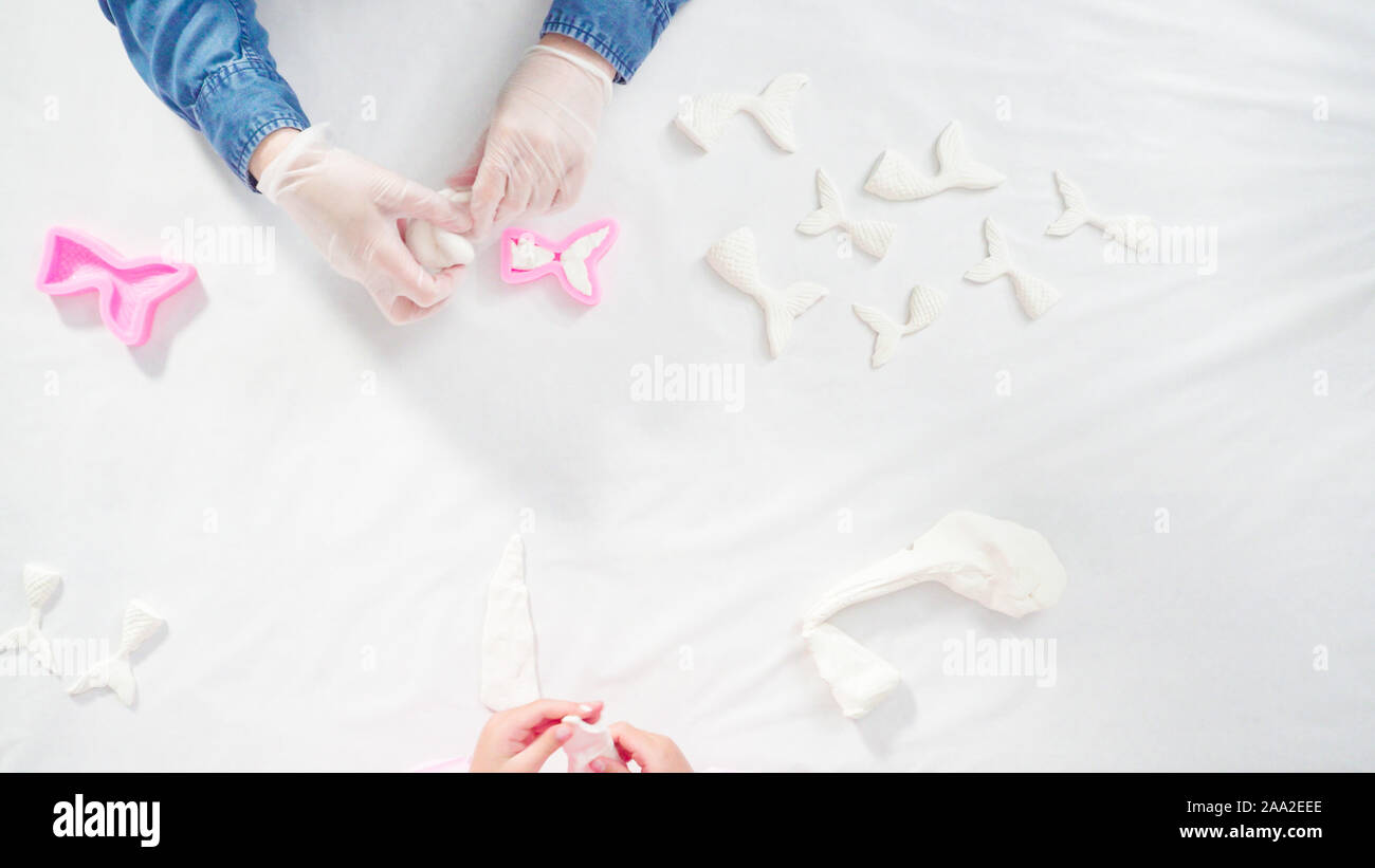 Flat lay. Step by step. Making mermaid tail from modeling clay in ...